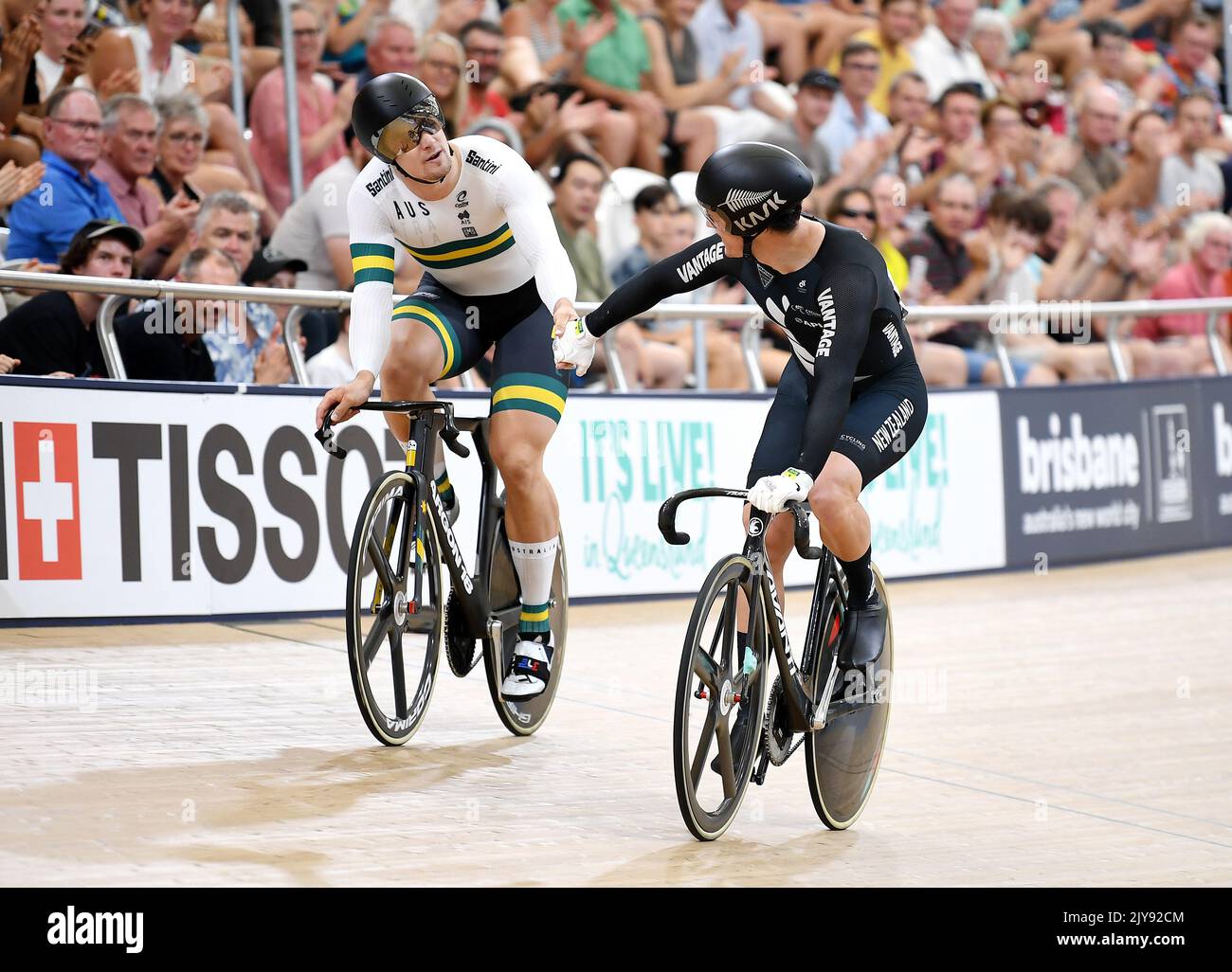 New Zealand's Sam Webster (right) shakes the hand of Australia's ...