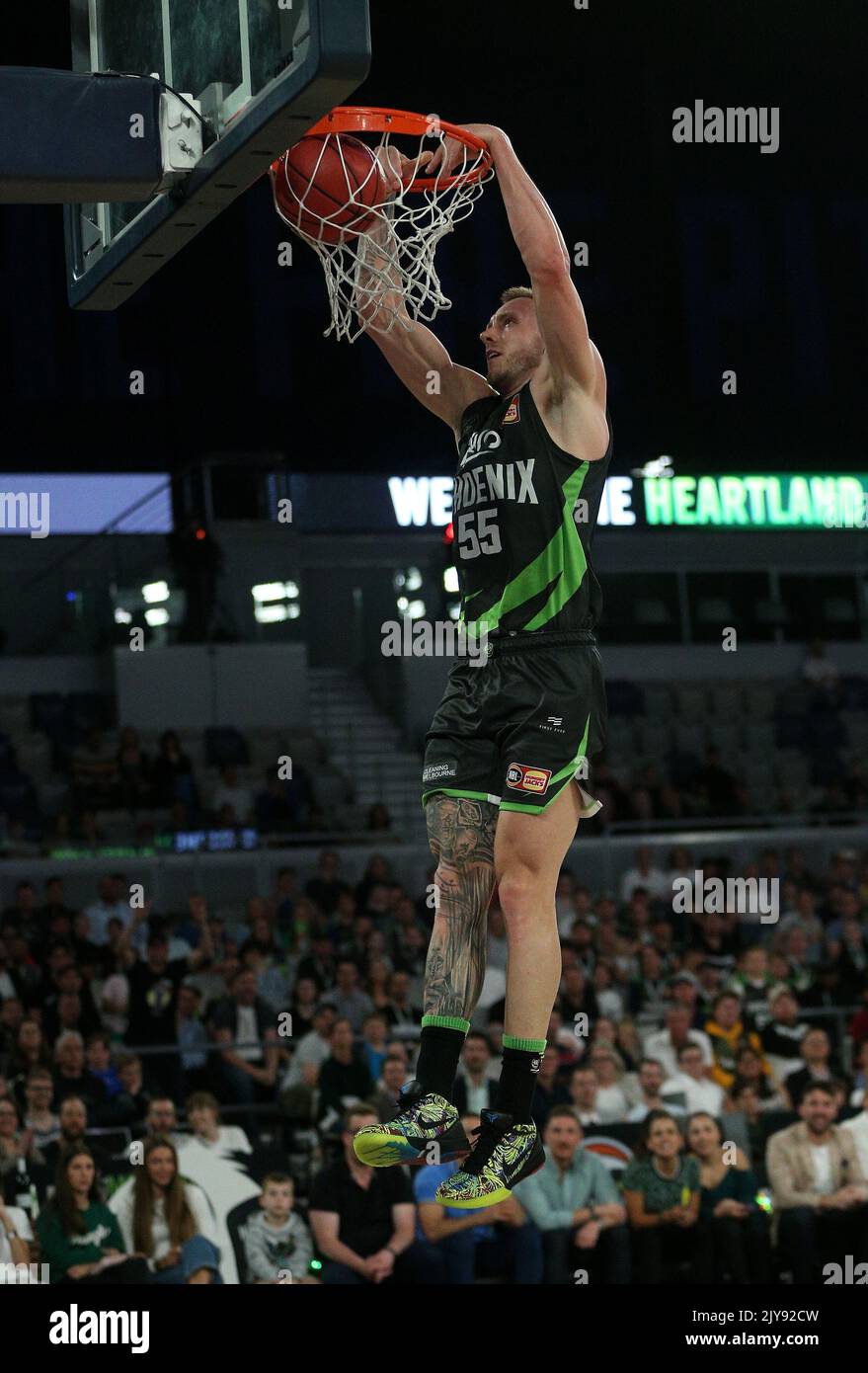 Mitch Creek of the Phoenix dunks during the Round 11 NBL match between ...
