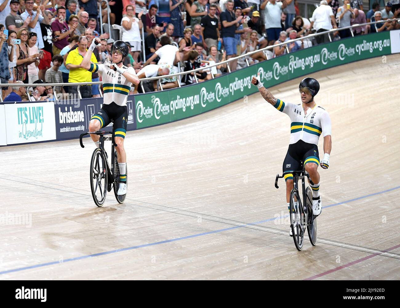 Australia's Sam Welsford (right) and teammate Cameron Meyer celebrate ...