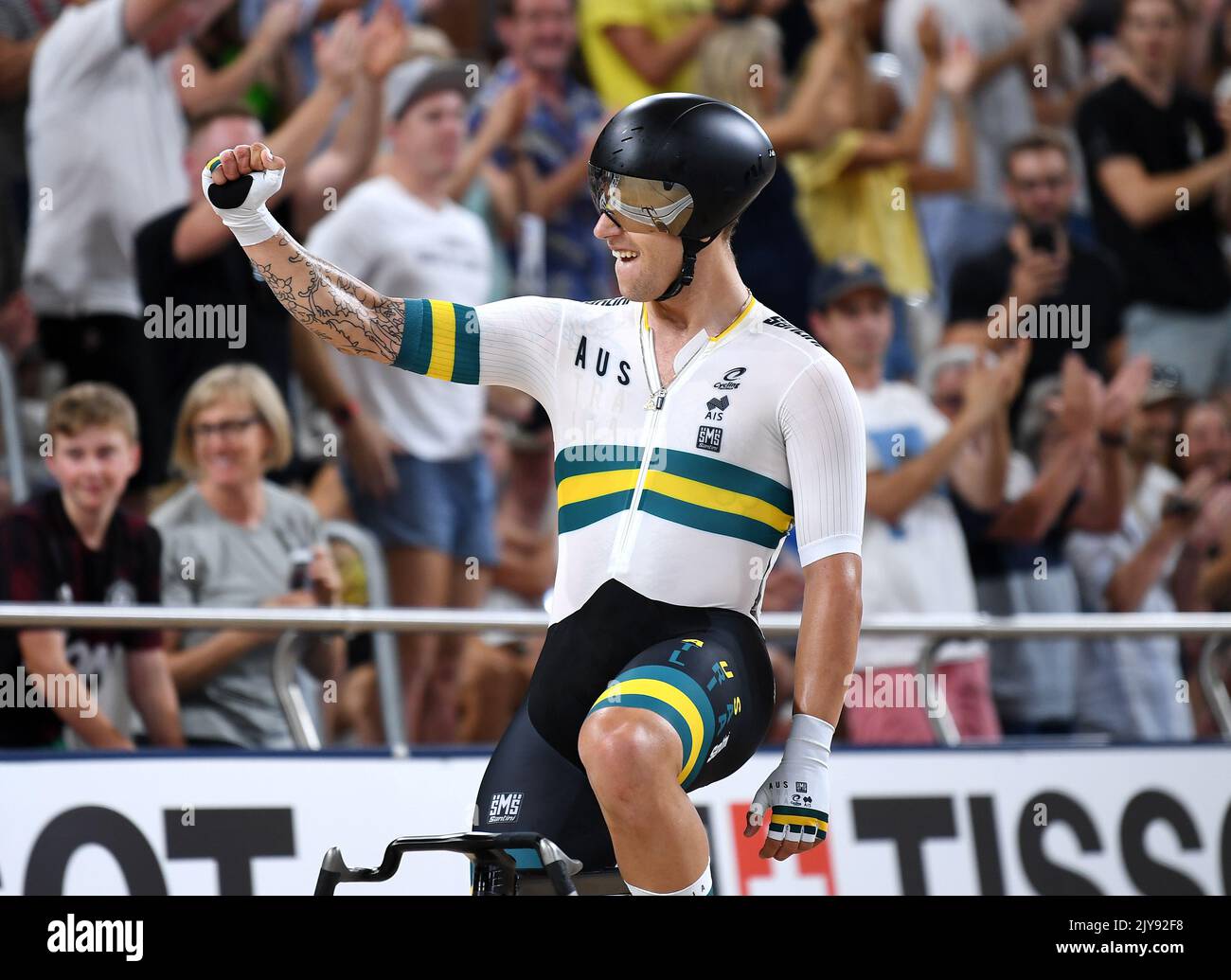 Australia's Sam Welsford celebrates winning the men's Madison 50km race ...