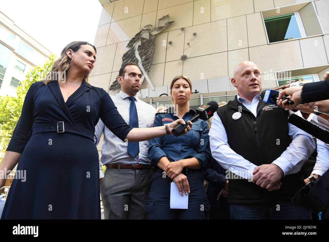 Victim Monica (2nd right), a Victorian Paramedic is seen outside of the ...