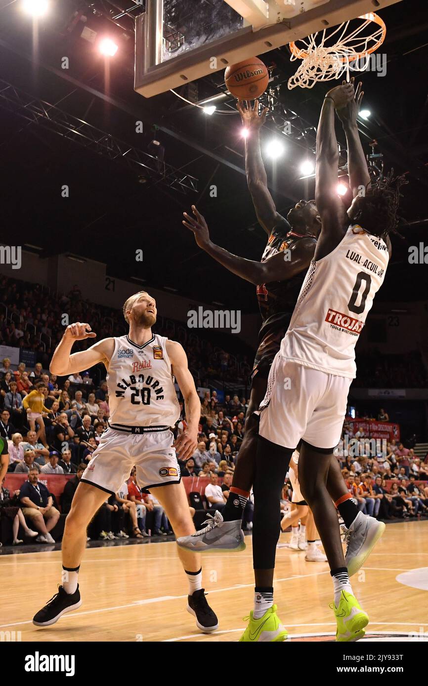 Sunday Dech of the Hawks beats Jo Lual Acuil of United to score during ...