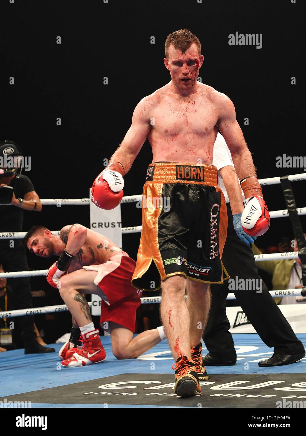 Australian boxers Jeff Horn walks away from Michael Zerafa after ...