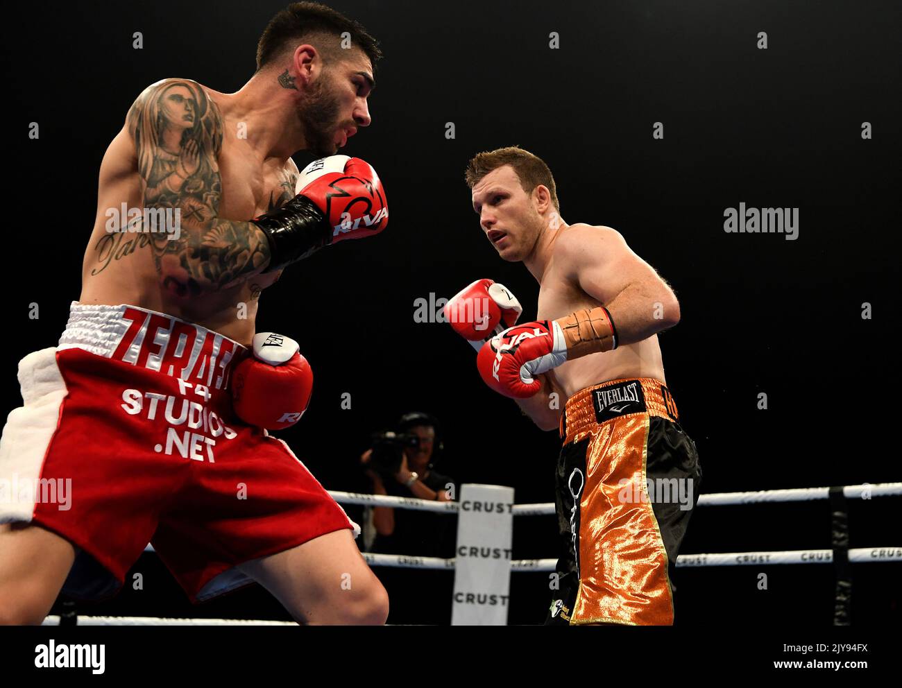 Australian boxers Jeff Horn (right) and Michael Zerafa fight during ...