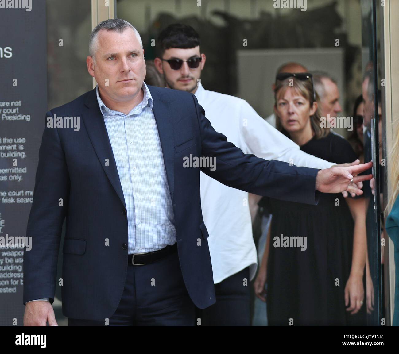 The VictimÕs family L to R brother Stevan Water, son Kieran Waters and ...