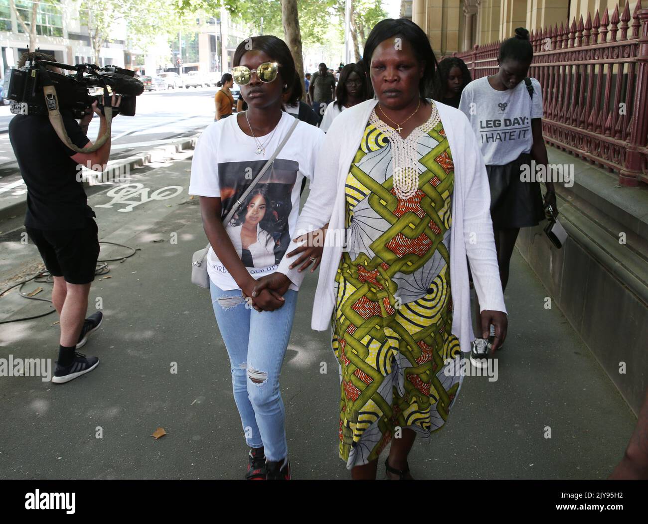 Family and friends of Laa Chol, outside the Supreme Court of Victoria ...