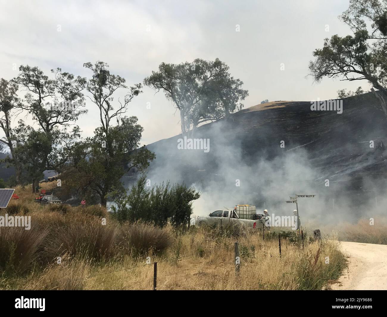 Smoke from a bushfire is seen near Gumeracha in the Adelaide Hills ...