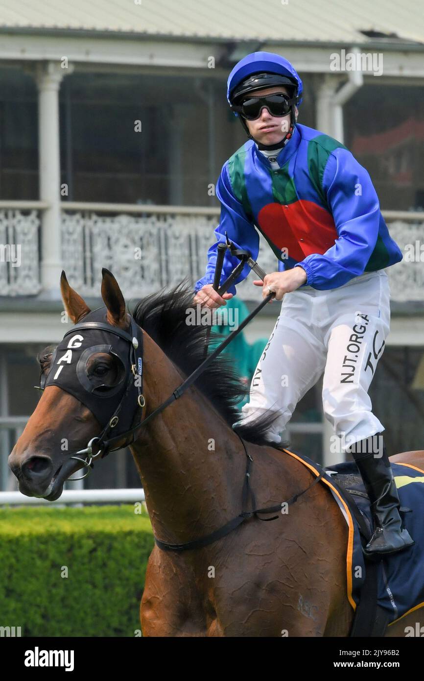 Jockey Tim Clark returns to scale after riding Vadiyann to victory in ...