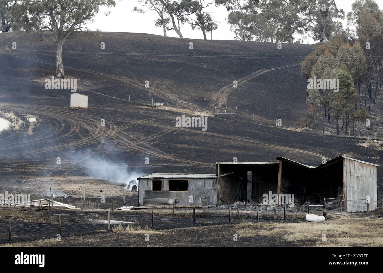 A burnt shed and scorched earth at Woodside in Adelaide, Sunday ...