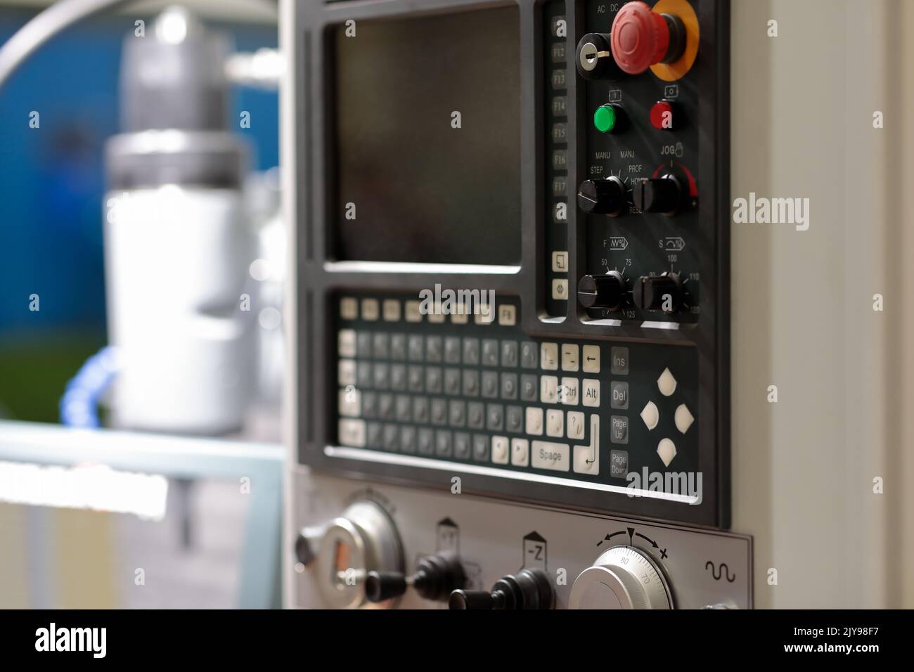 Control panel of vertical CNC milling machine. Selective focus Stock Photo - Alamy