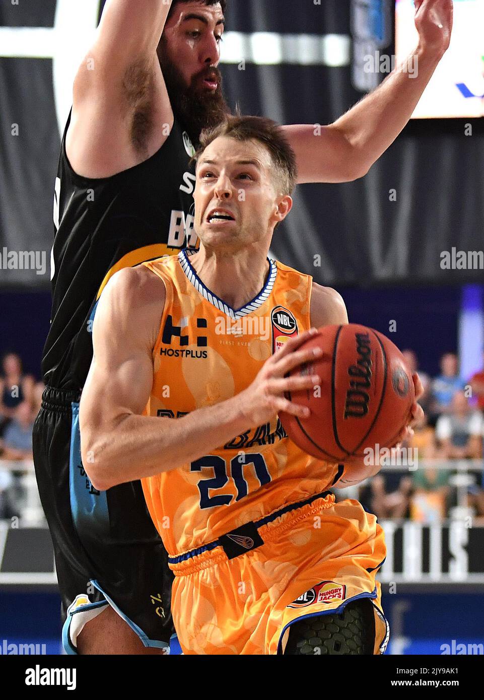 Nathan Sobey of the Bullets (front) pushes through Jordan Ngatai of the ...