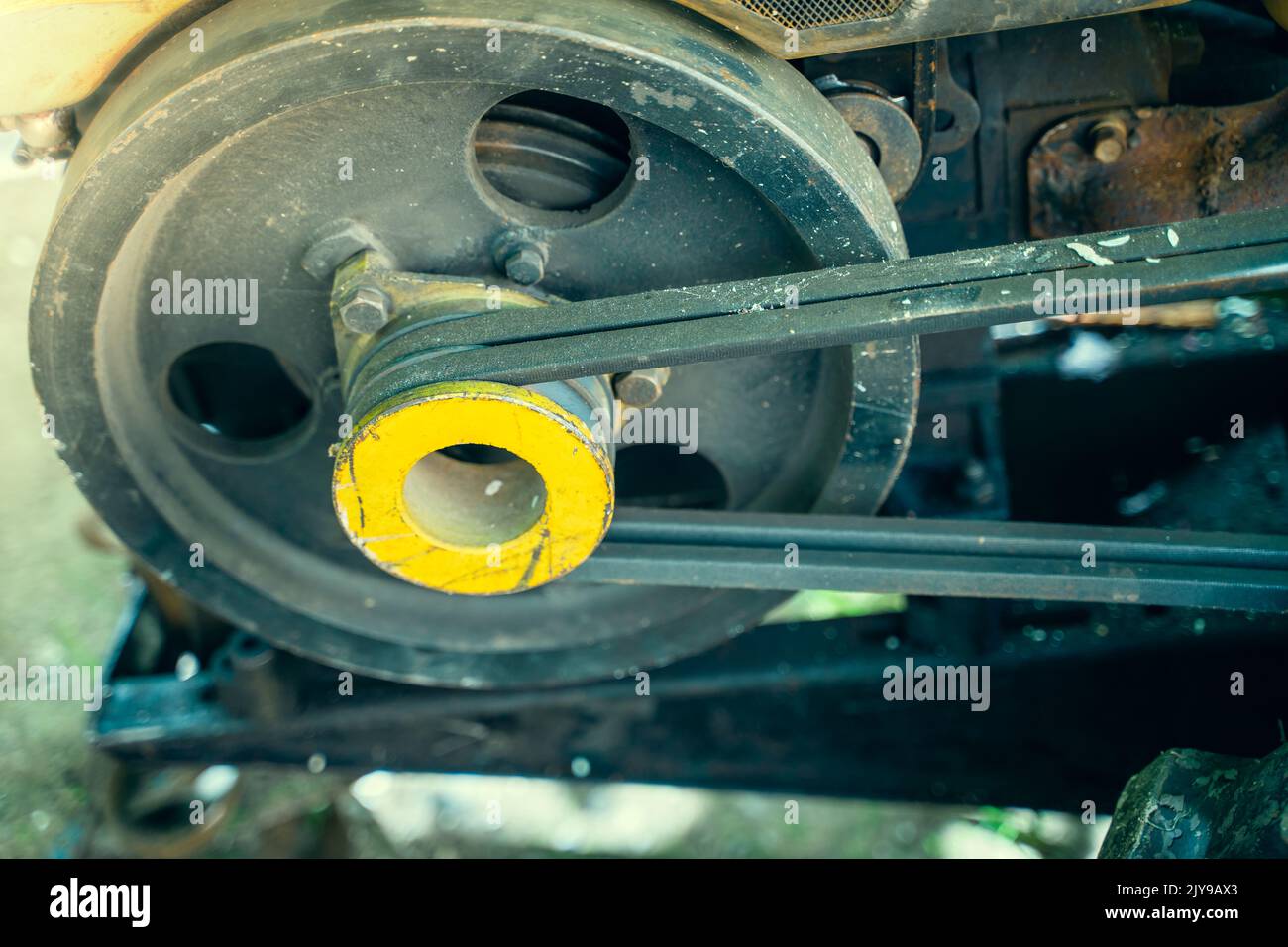 Belt drive of a garden rural motor-block. Driven two-strand pulley of a ...