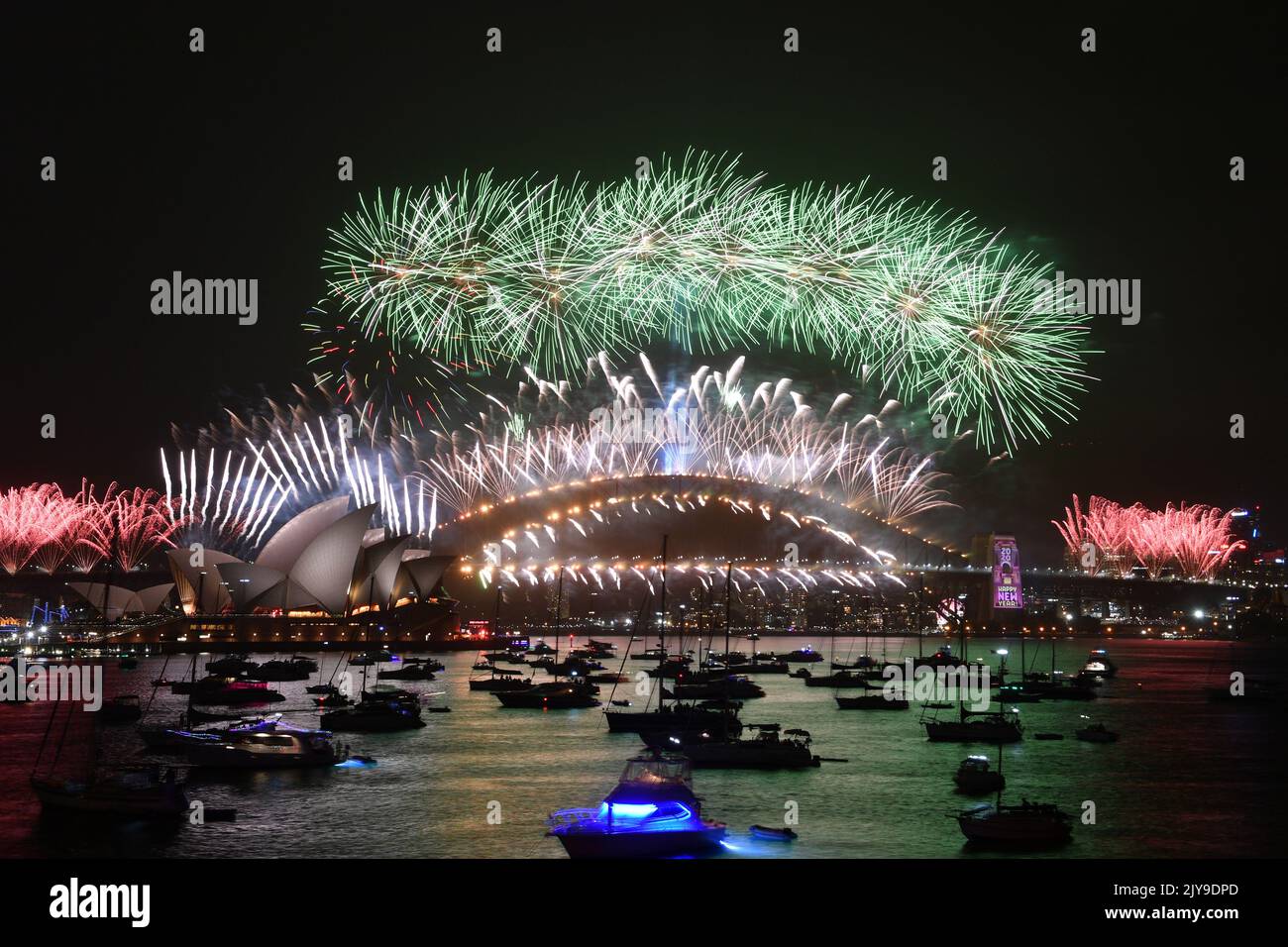 The midnight fireworks are seen from Mrs Macquarie's Chair during New ...