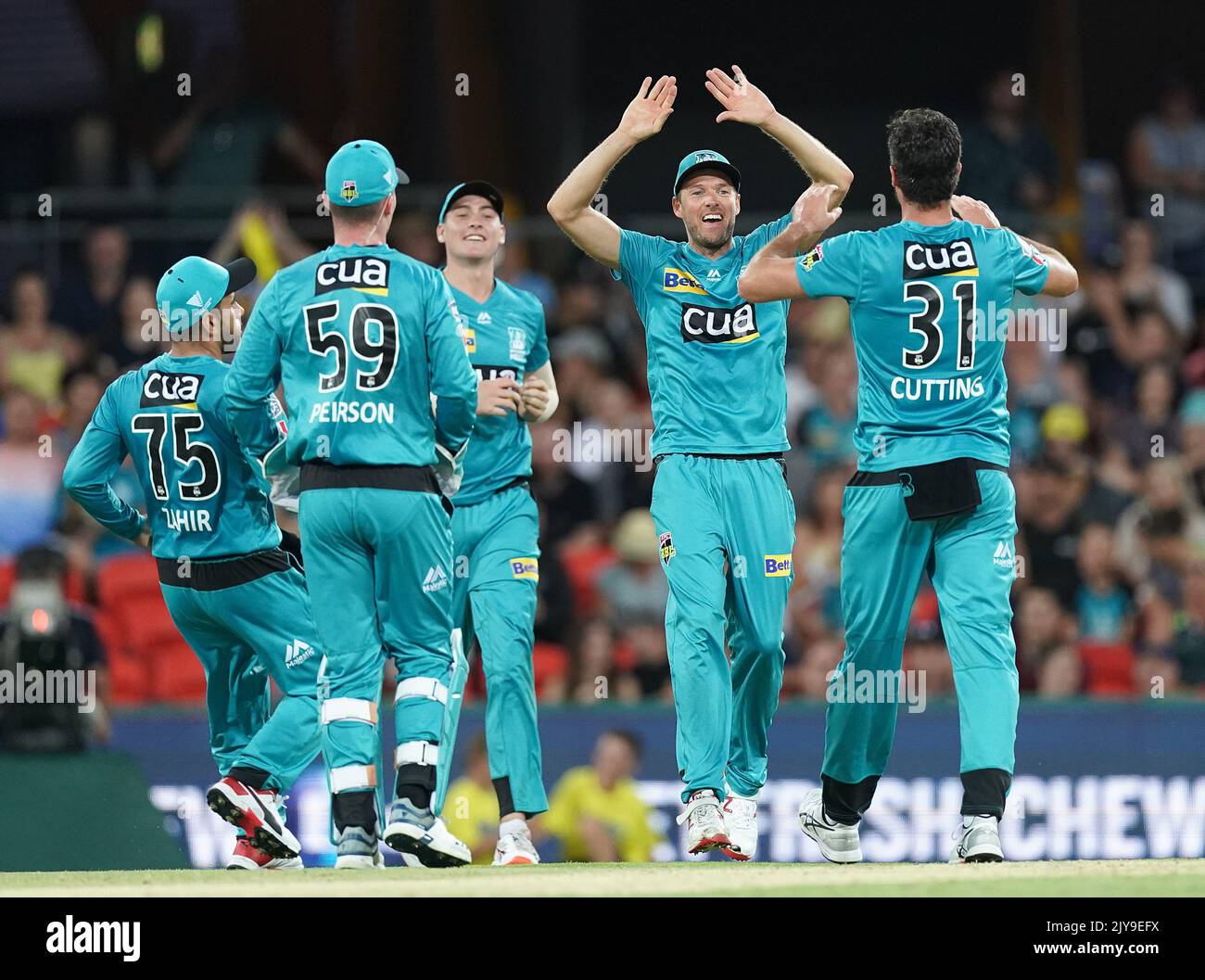 Ben Laughlin of the Heat (right) reacts after a wicket during the Big ...