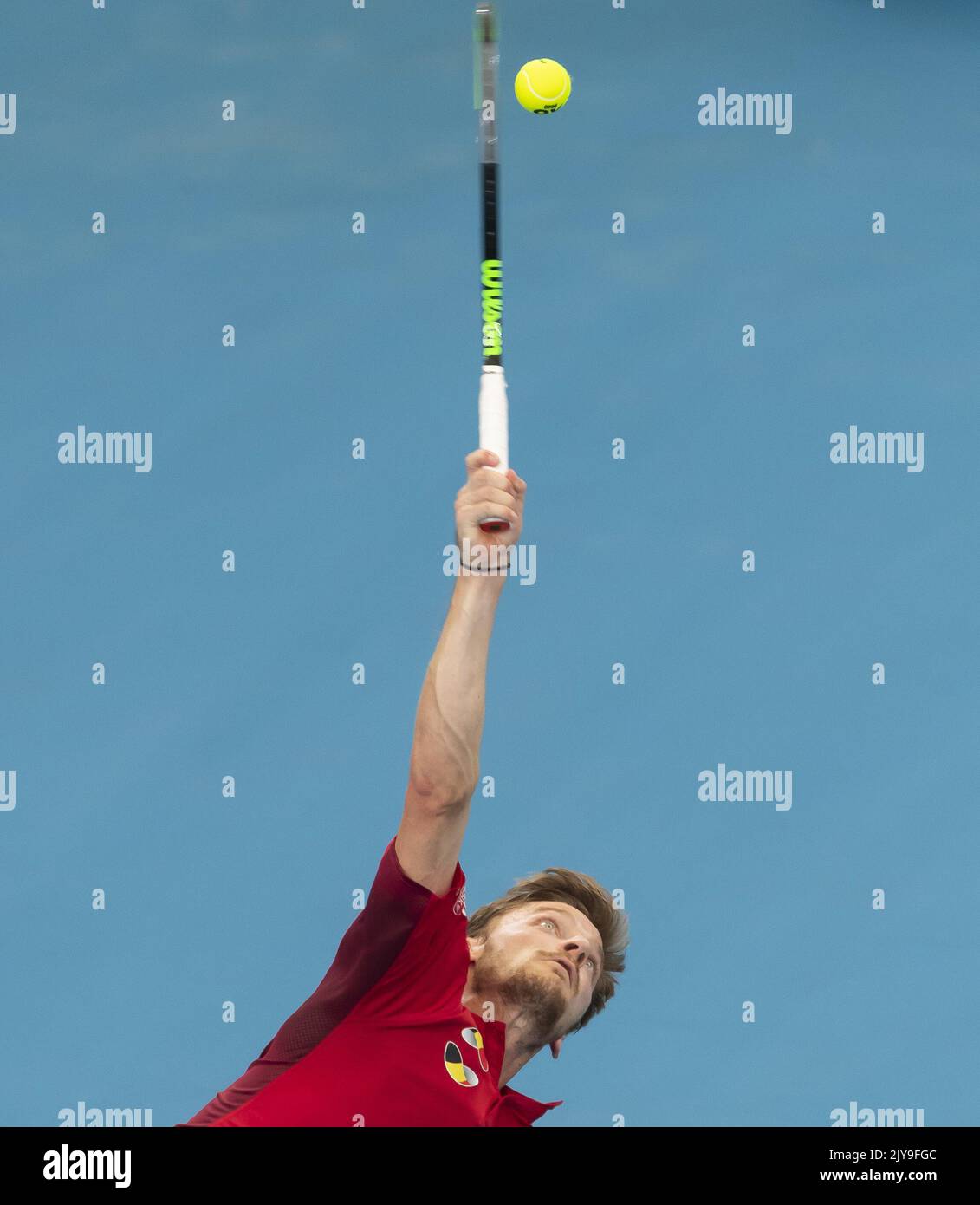 David Goffin of Belgium serves the ball to Radu Albot of Moldova during ...