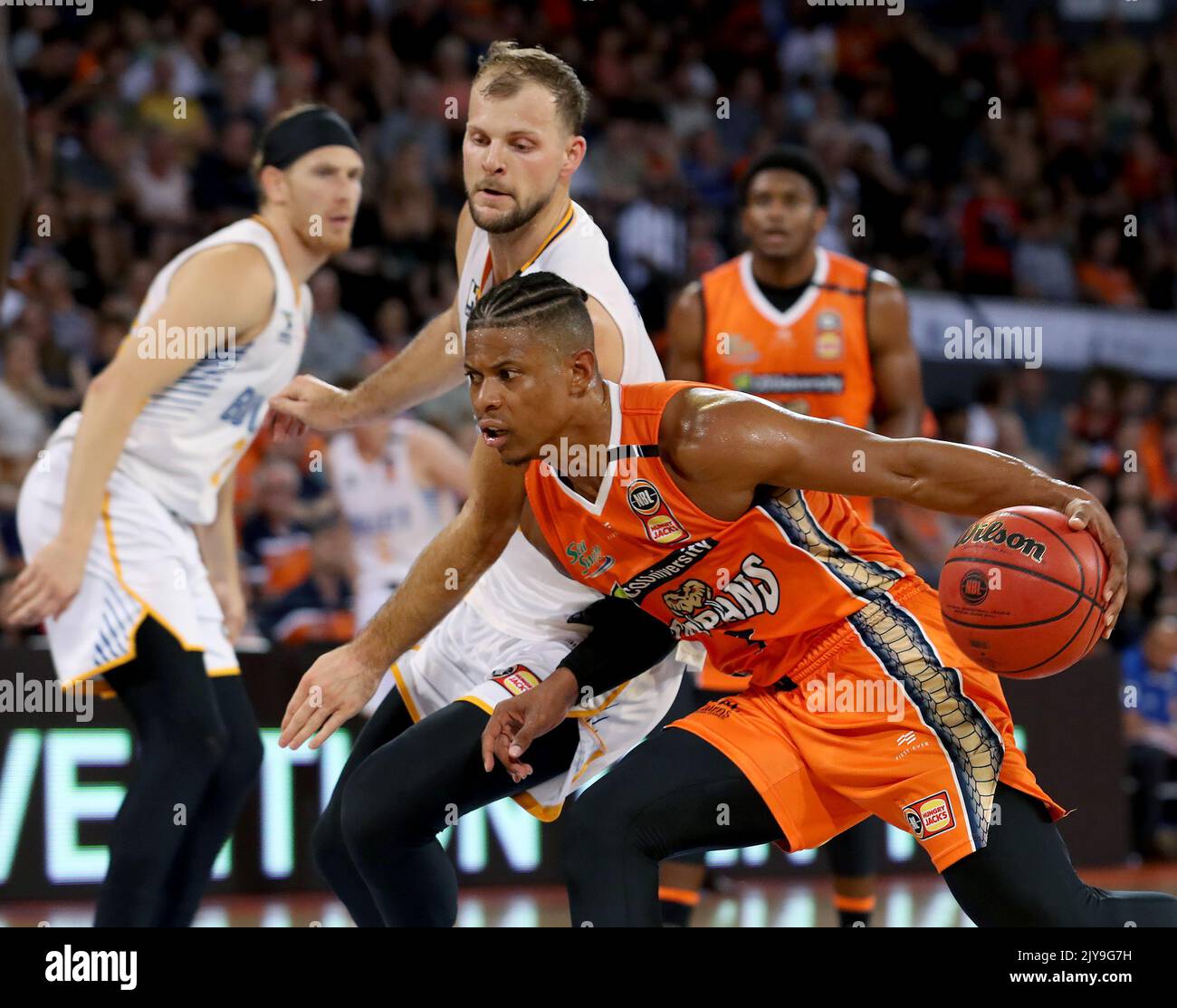 Taylor Braun of the Bullets and Scott Machado of the Taipans during the ...