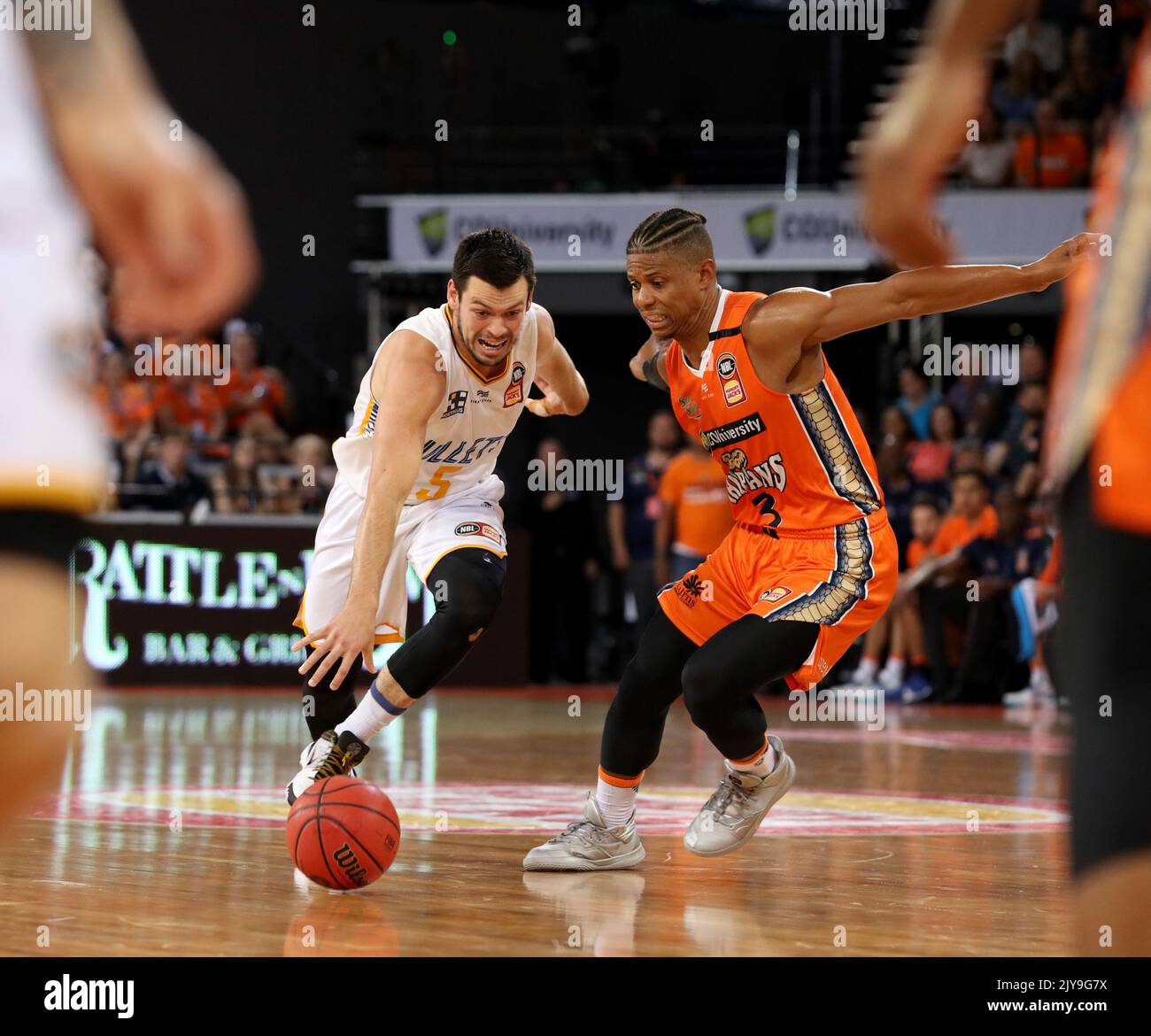 Scott Machado of the Taipans and Jason Cadee of the Bullets during the ...