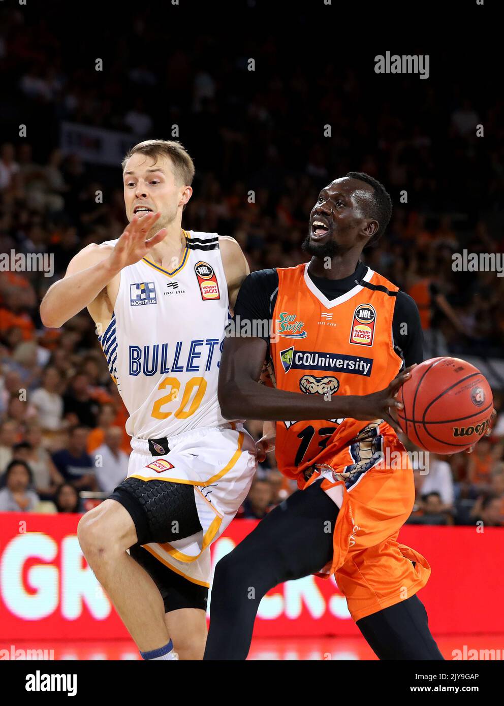 Majok Deng of the Taipans and Nathan Sobey of the Bullets during the ...