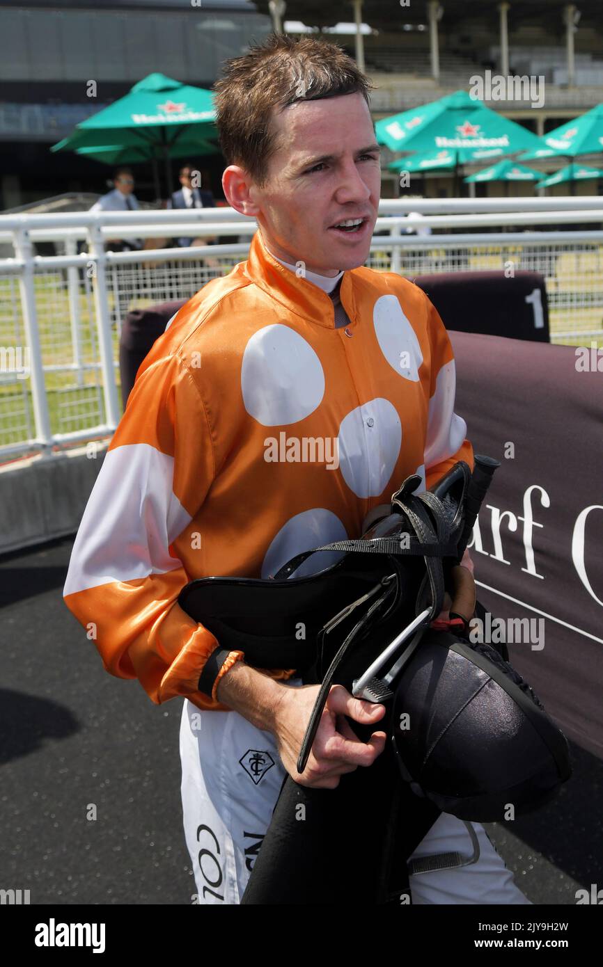 Jockey Jason Collett is seen after riding Lashes to victory in race 4 ...
