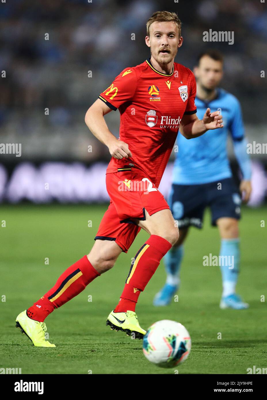 Ben Halloran of Adelaide passes the ball during the Round 13 A-League ...