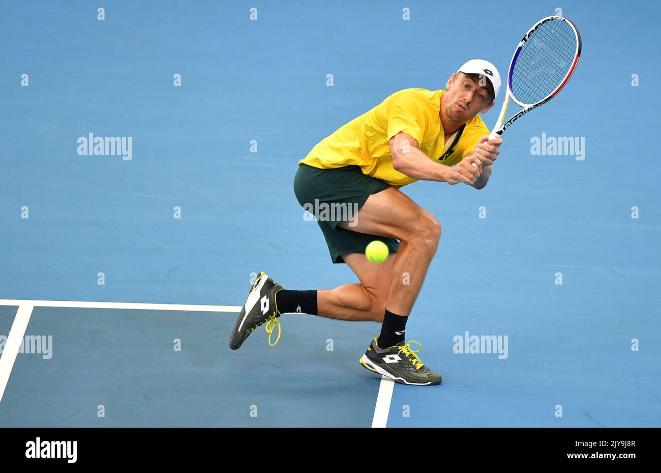 John Millman of Australia in action against Felix Auger-Aliassime of ...