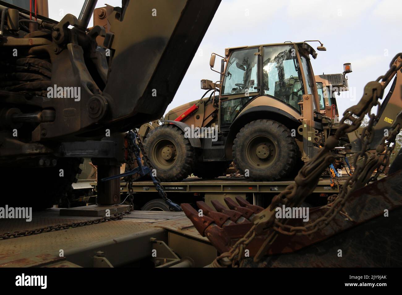An Australian Defence Force bulldozer is seen ahead of Australian Army ...