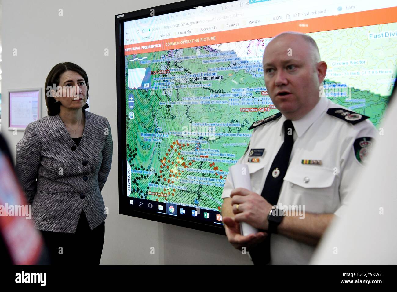 NSW Premier Gladys Berejiklian is briefed by RFS Commissioner Shane ...