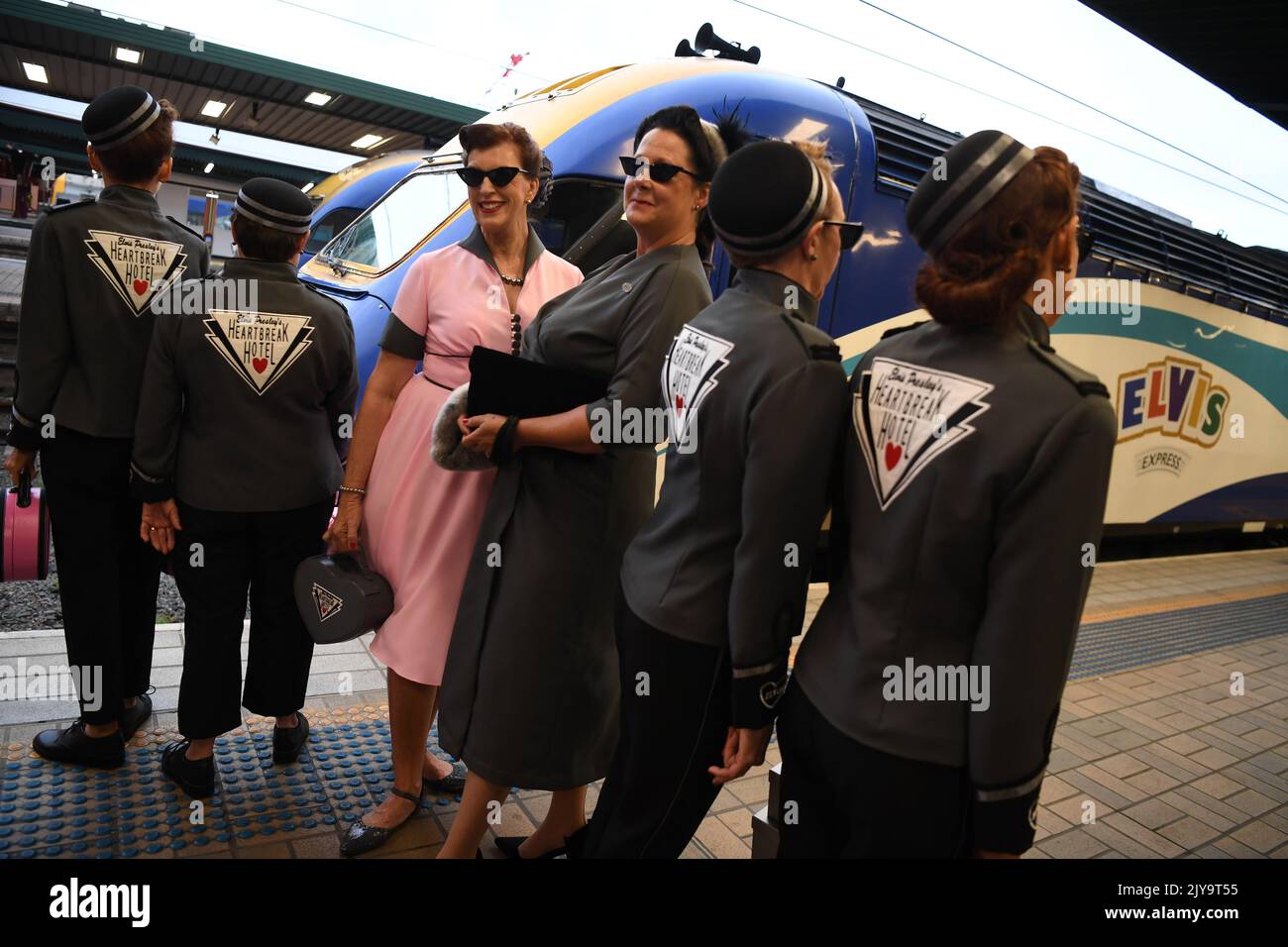 Performers from Elvis Presley's Heartbreak Hotel group pose for a photo ...
