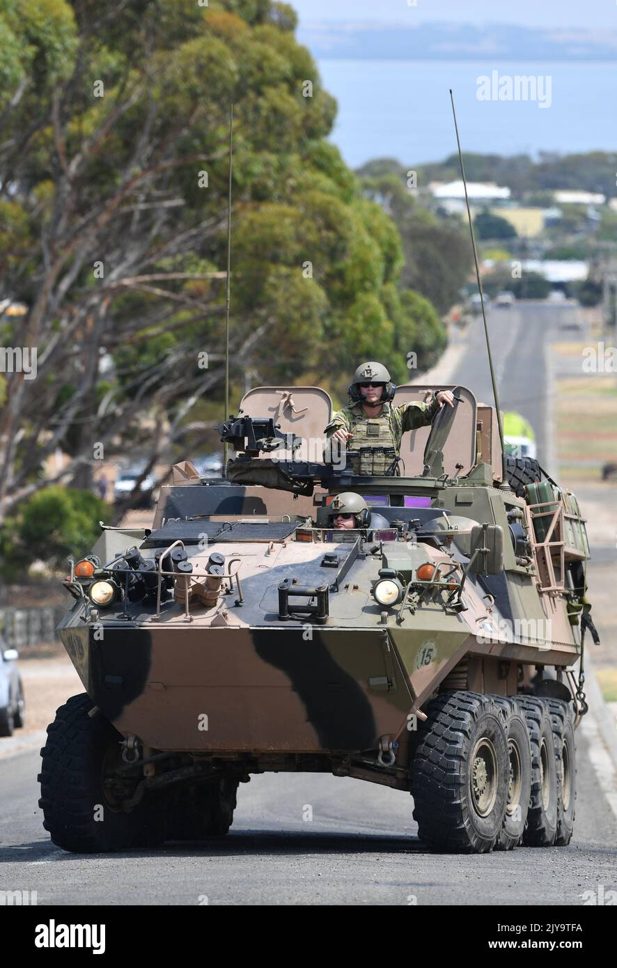 A convoy of Australian light armoured vehicles is seen in Kingscote on ...