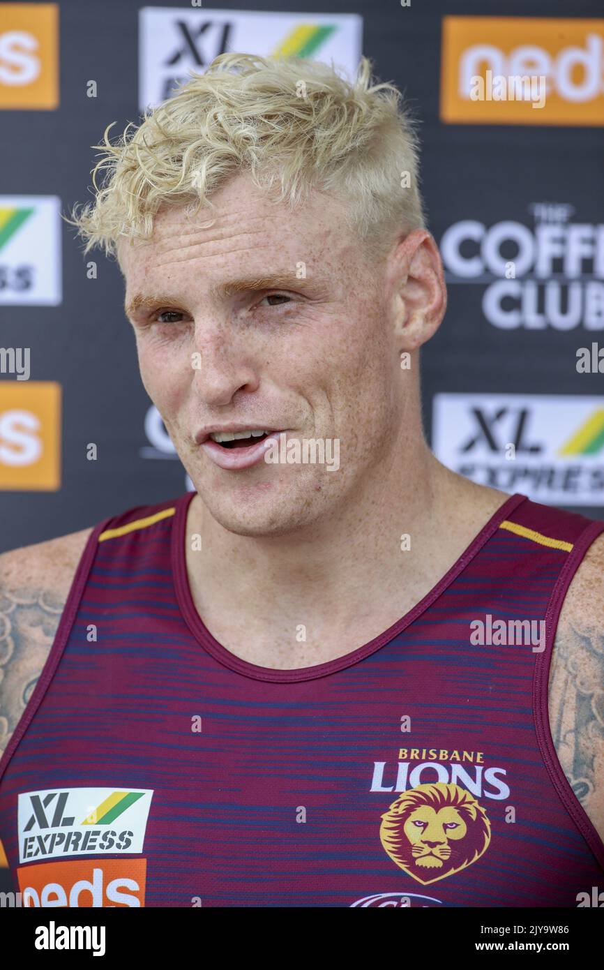 Mitch Robinson speaking to media during a training session with the ...