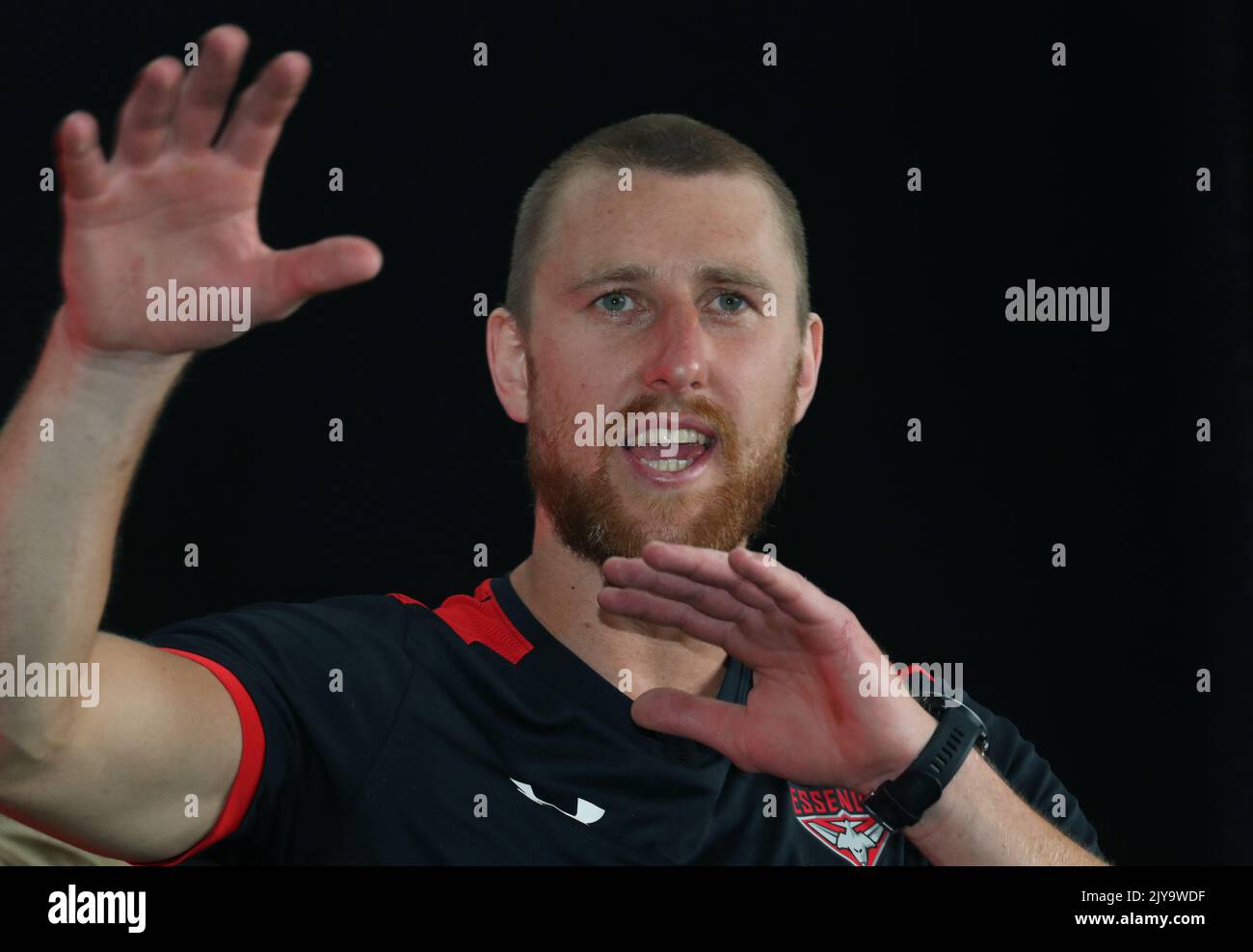 Essendon captain Dyson Heppell gets his famous hair cut off as he takes ...