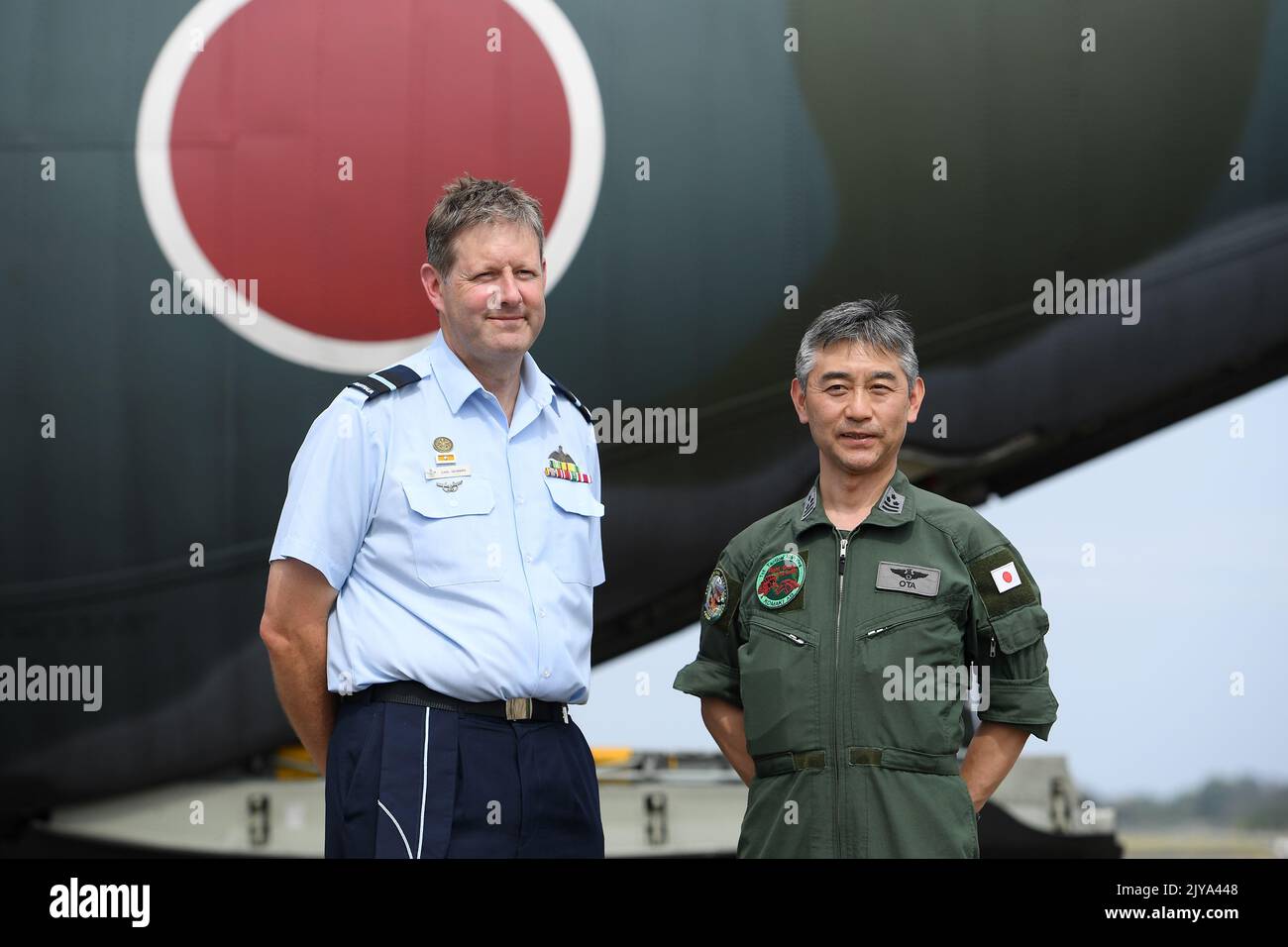 RAAF Air Commodore Carl Newman poses for a photograph with Japan Air ...