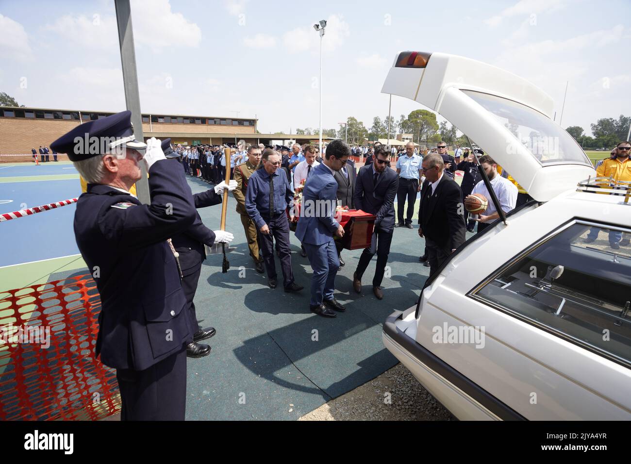 Sam’s casket is carried through a guard of honour during the funeral of ...