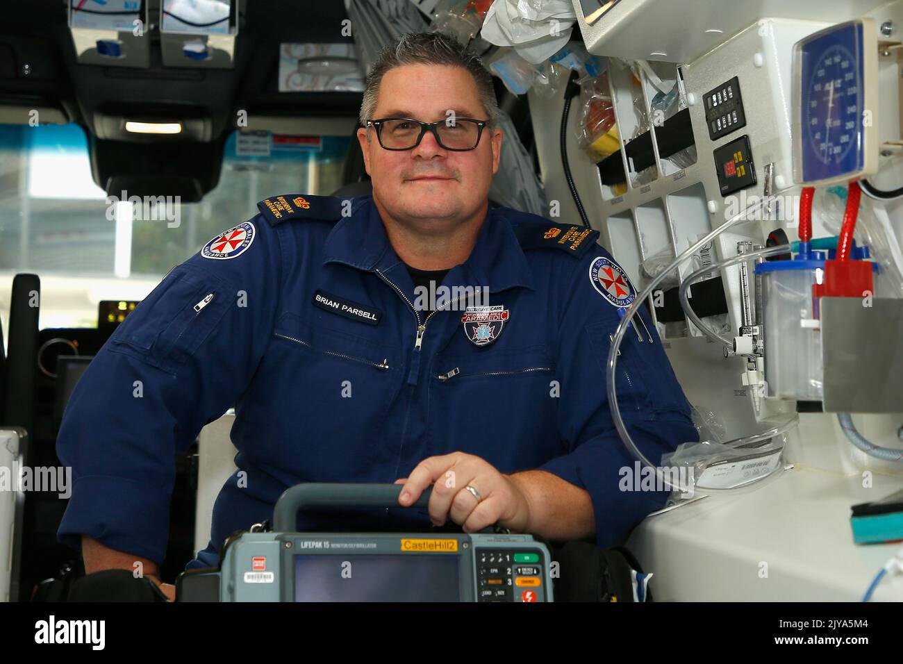 ICU paramedic Brian Parsell poses for a photo during a press conference ...