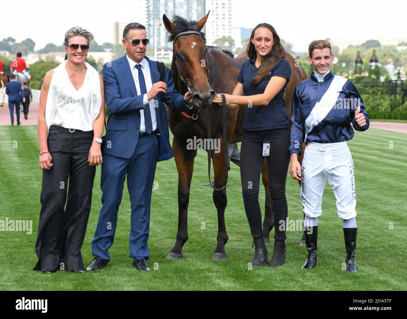 Trainer Michael Kent poses with jockey Beau Mertens and trainer Nikki ...