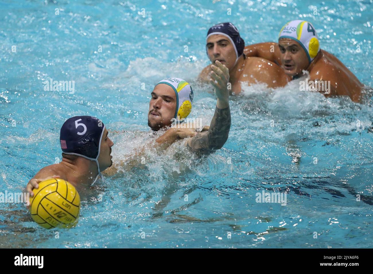 Benjamin Hallock of the USA with the ball is defended by Aaron Younger ...