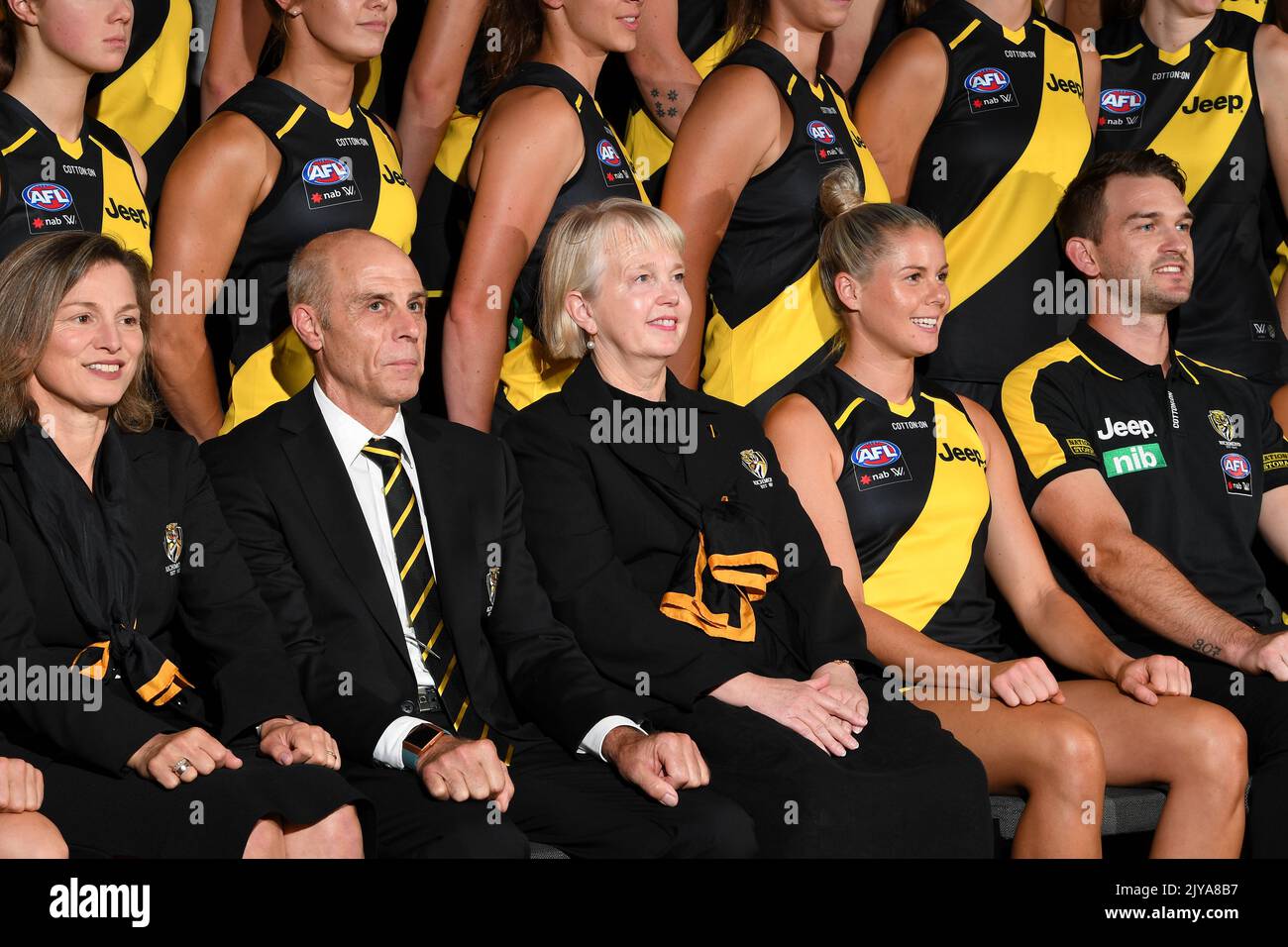 President of the Richmond Football Club Peggy O'Neal (centre) looks on ...
