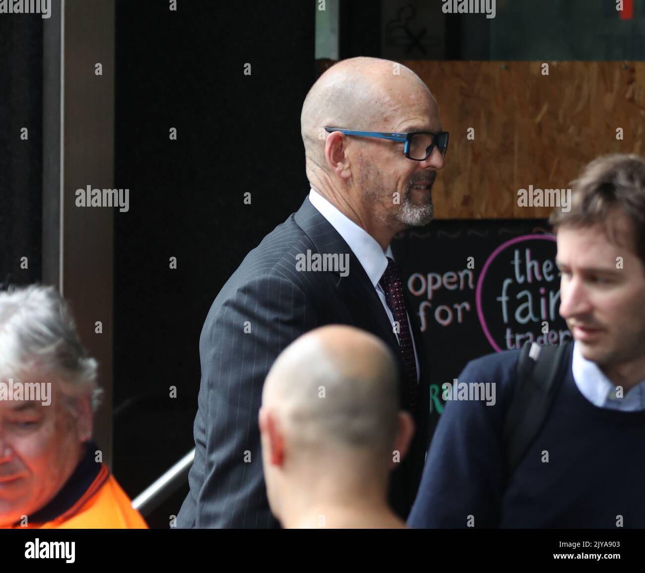 Former Victoria Police commissioner Simon Overland arrives at the Royal ...