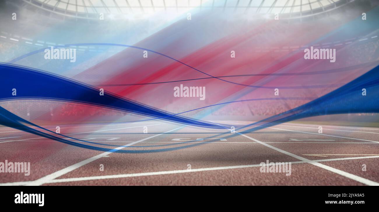 Digitally generated image of red and blue trails at stadium Stock Photo ...