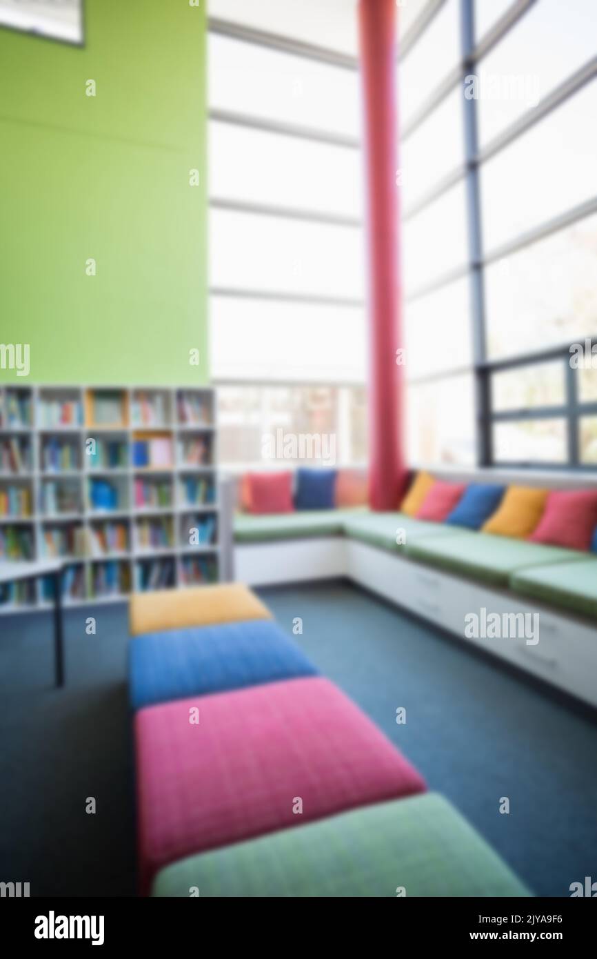 Seat and bookshelf in library Stock Photo - Alamy