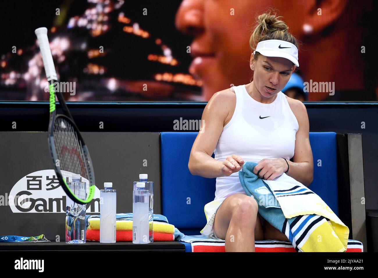 Simona Halep of Romania throws her racquet during her first round match ...