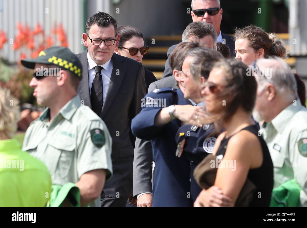 Mourners are seen arriving for the funeral for veteran firefighter Bill ...