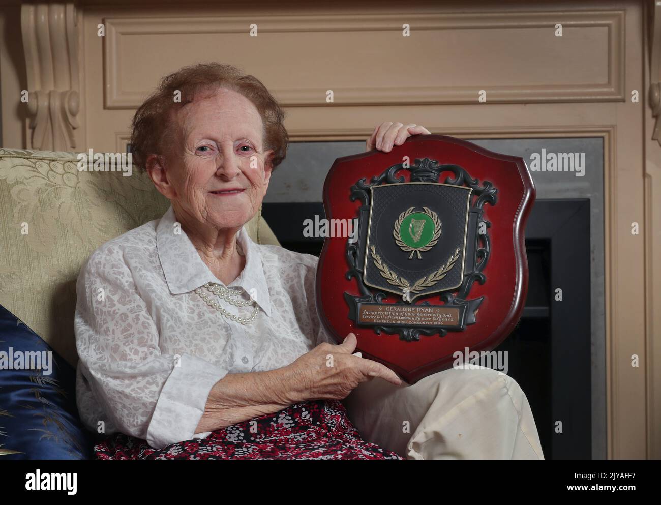 Geraldine Ryan, 89, poses for a photograph holding one of her many dancing shields at her home ...