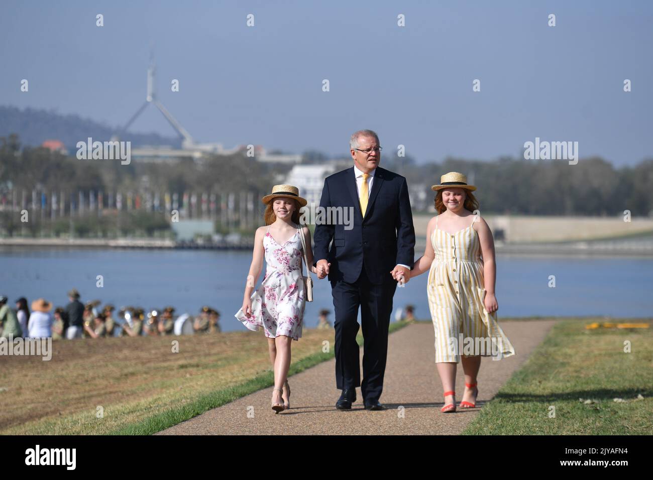 Prime Minister Scott Morrison and daughters Abbey and Lily arrive at an ...