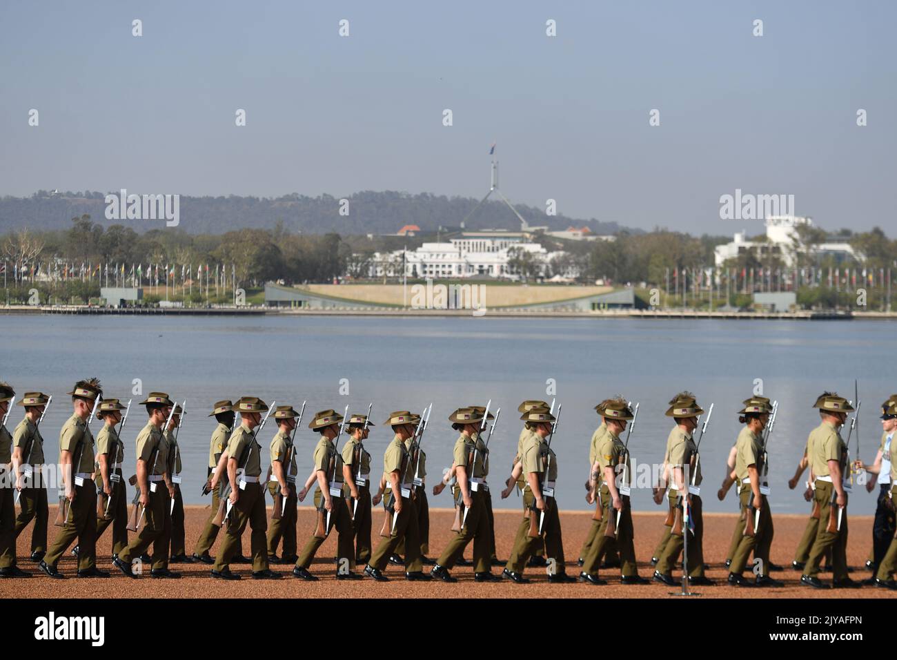 The Guard of Honour march during an Australia Day Citizenship Ceremony ...