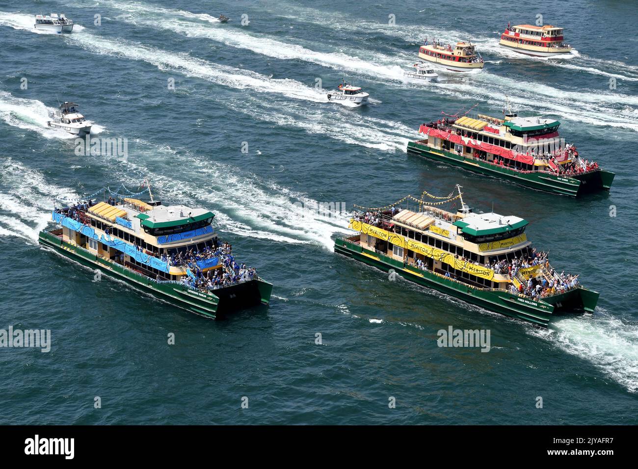Passenger ferries race on the Sydney Harbour during Australia Day ...