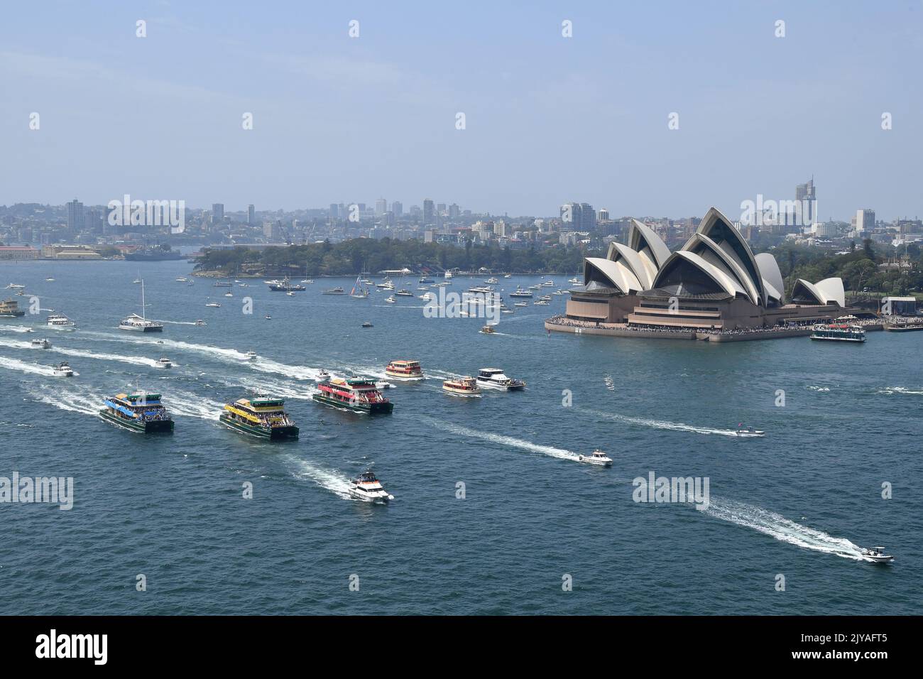 Passenger ferries race on the Sydney Harbour during Australia Day ...