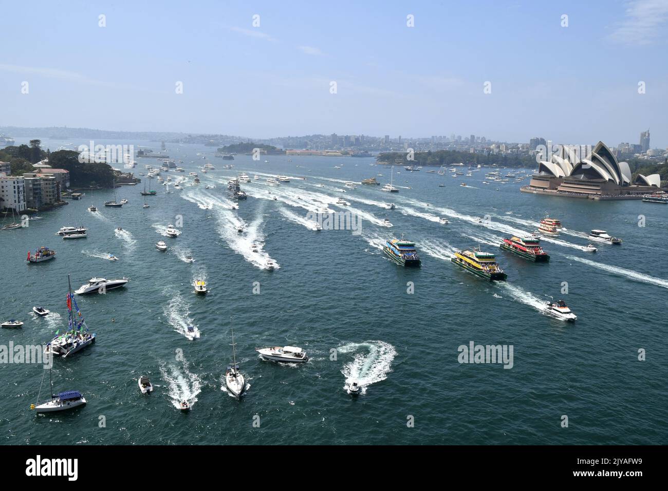 Passenger ferries race on the Sydney Harbour during Australia Day ...