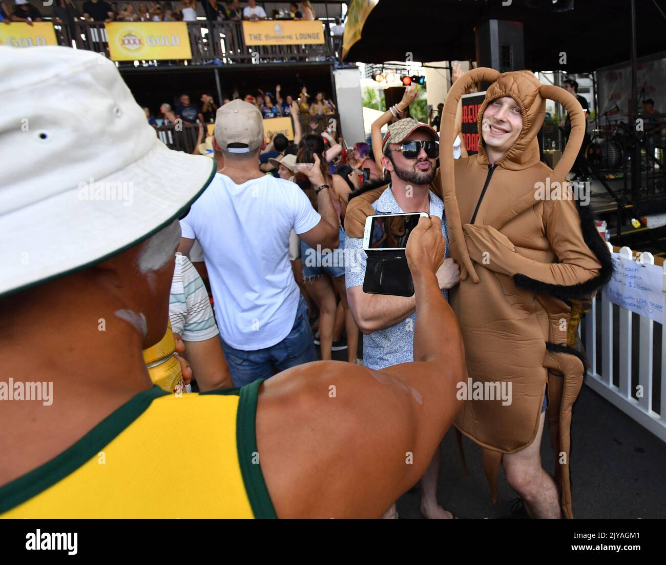 A person dressed as a cockroach is seen during Australia Day ...