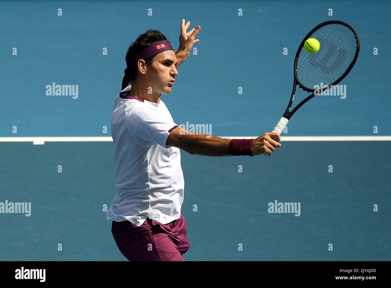 Roger Federer of Switzerland plays a return shot during his fifth round ...